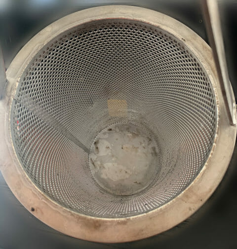 Bitumen Clogged Stainless-Steel Strainers Cleaned with FQE Solvent-ME